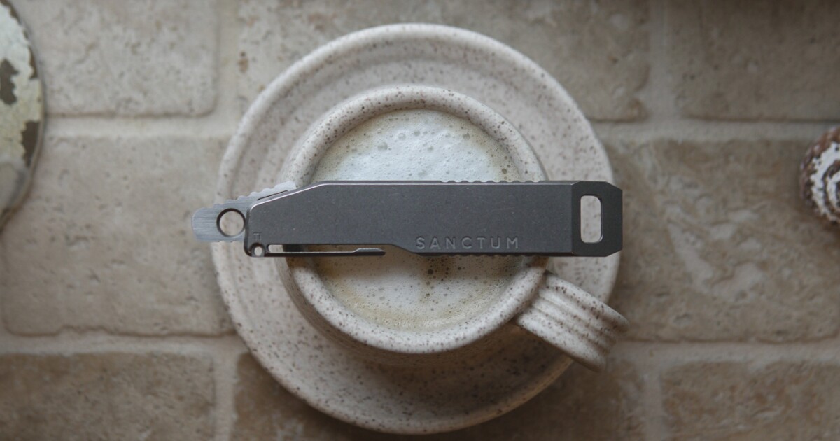 Ultra-light multitool rocks a knife housed in a rigid titanium sheath