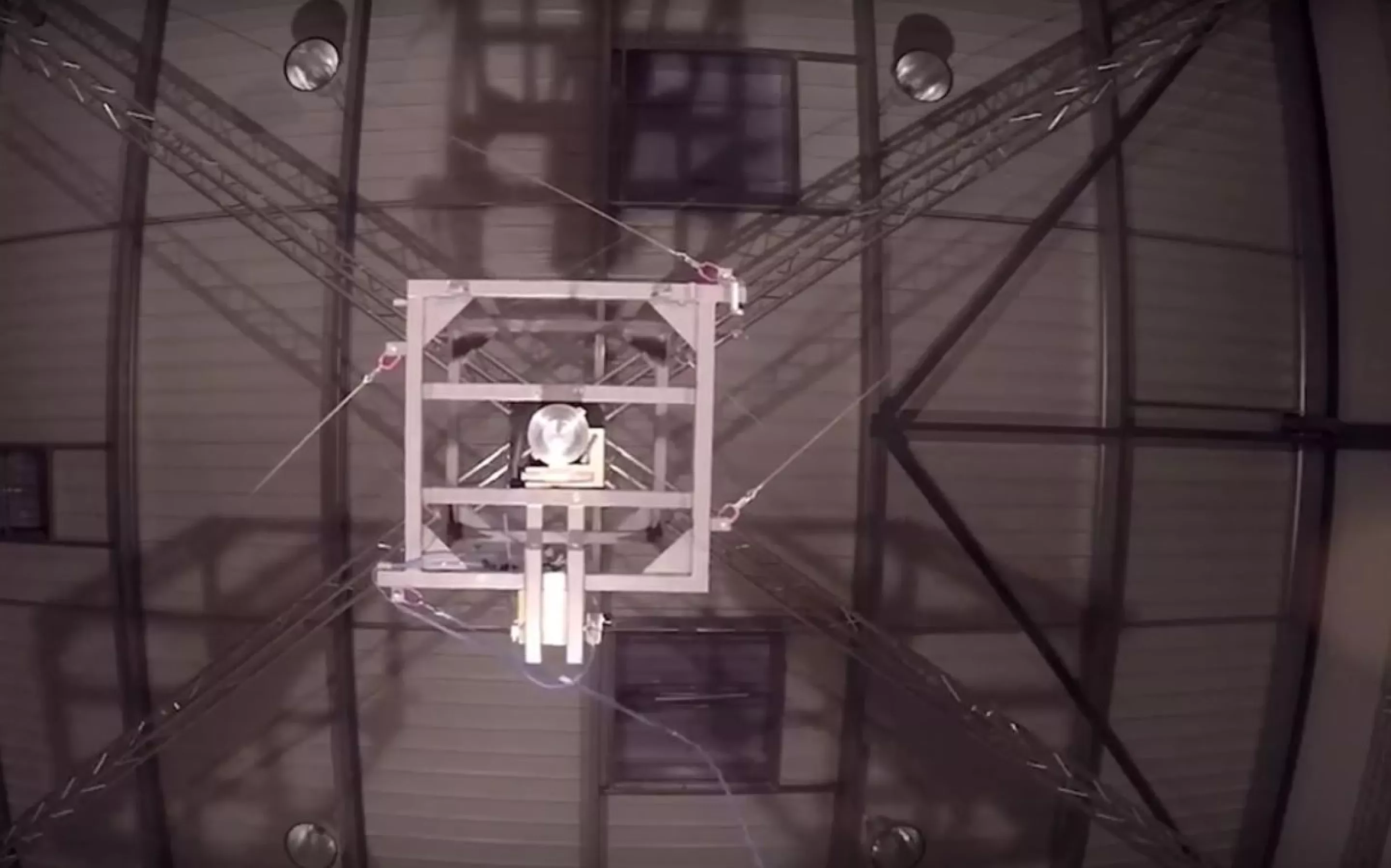 Cable-driven robot monitors buildings as it prints them