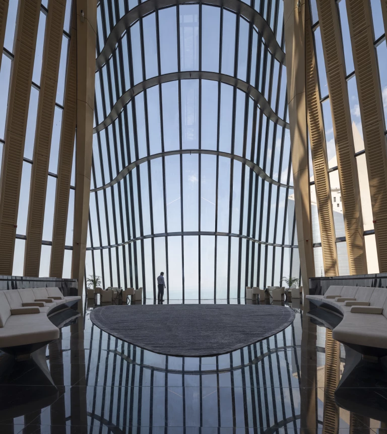 Foster + Partners' tapering tower keeps office workers in the shade