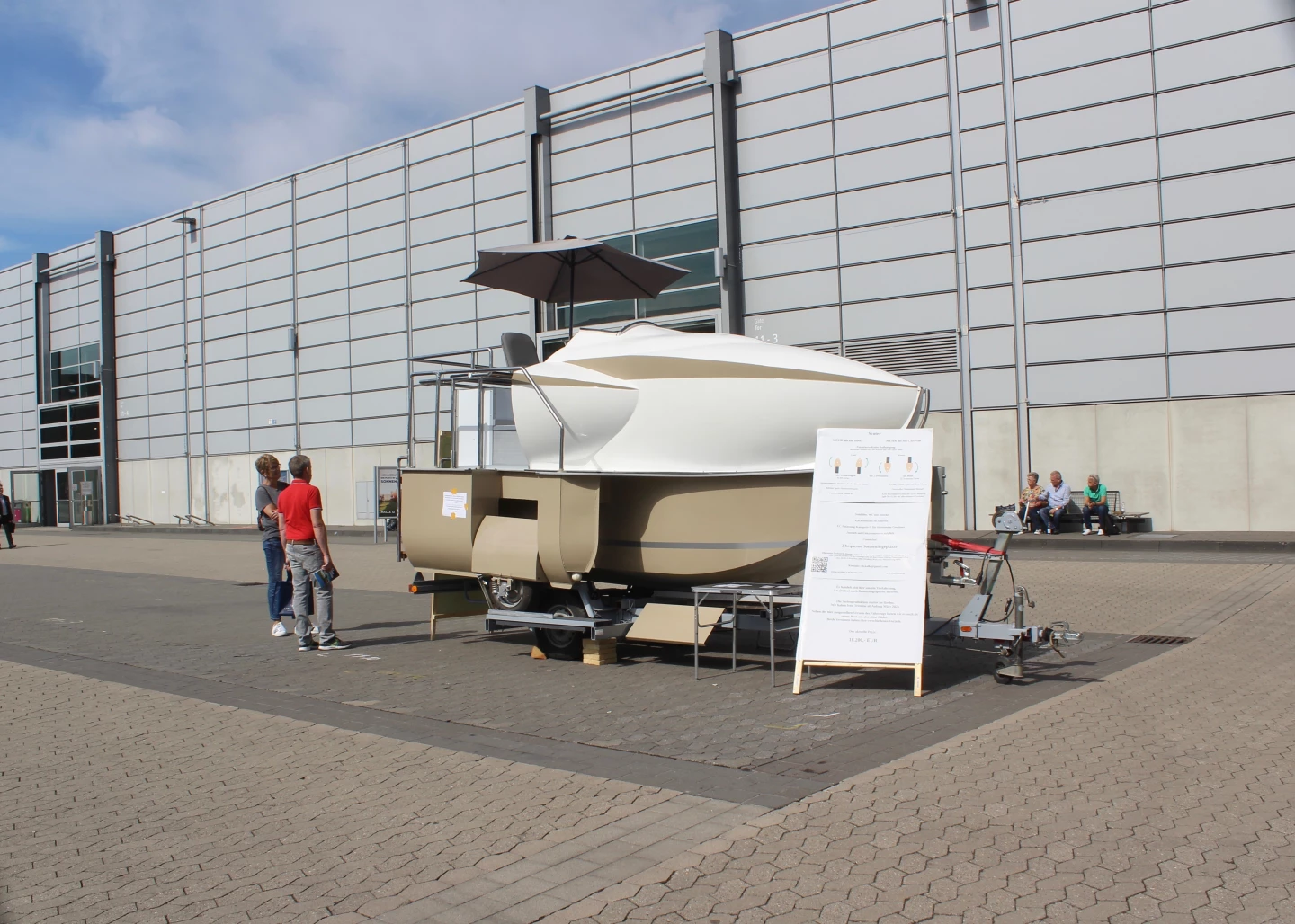 "Unsinkable" amphibious caravan flips wheels into hulls to float-camp