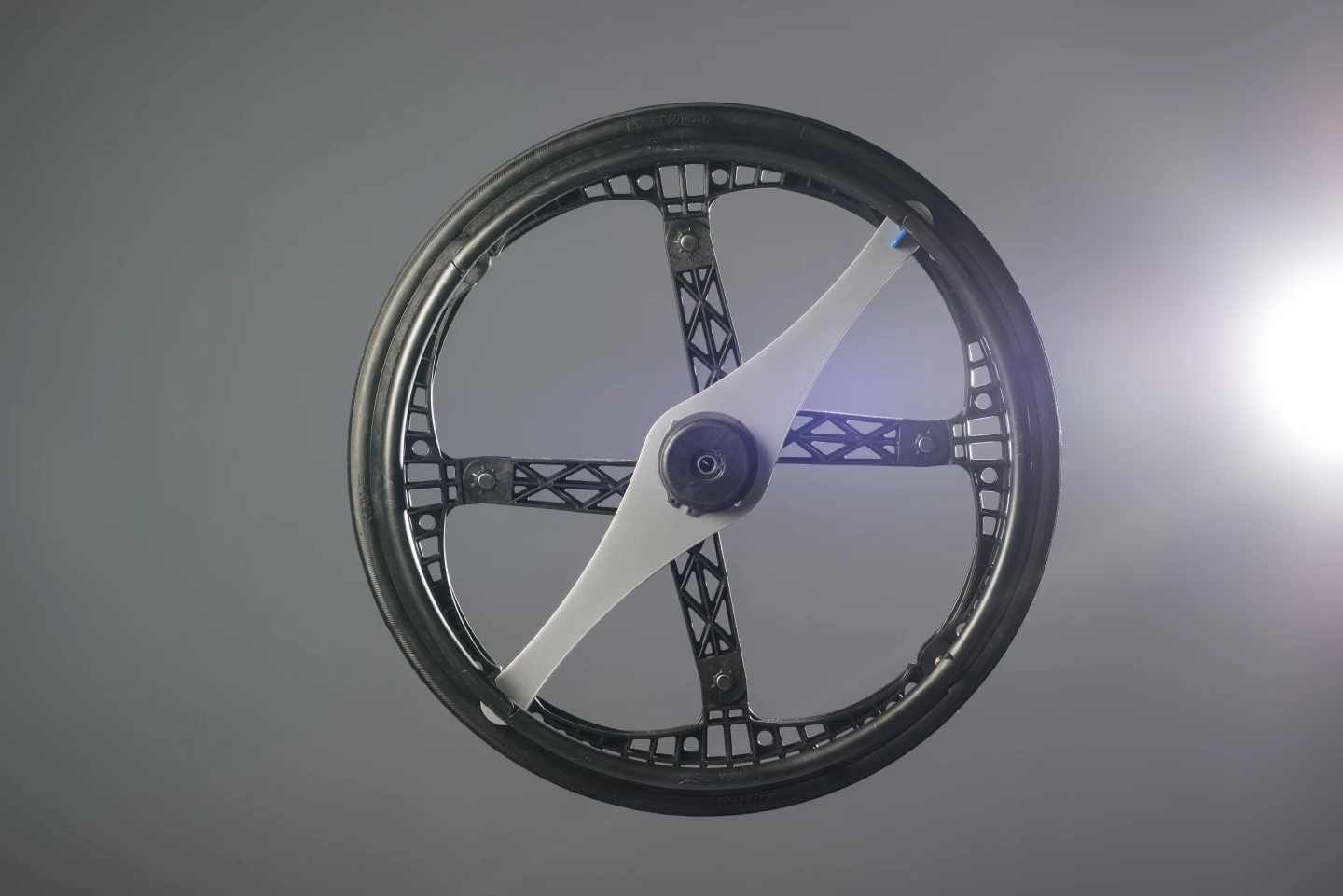 The Morph Wheel folds in half to make wheelchair travel easier
