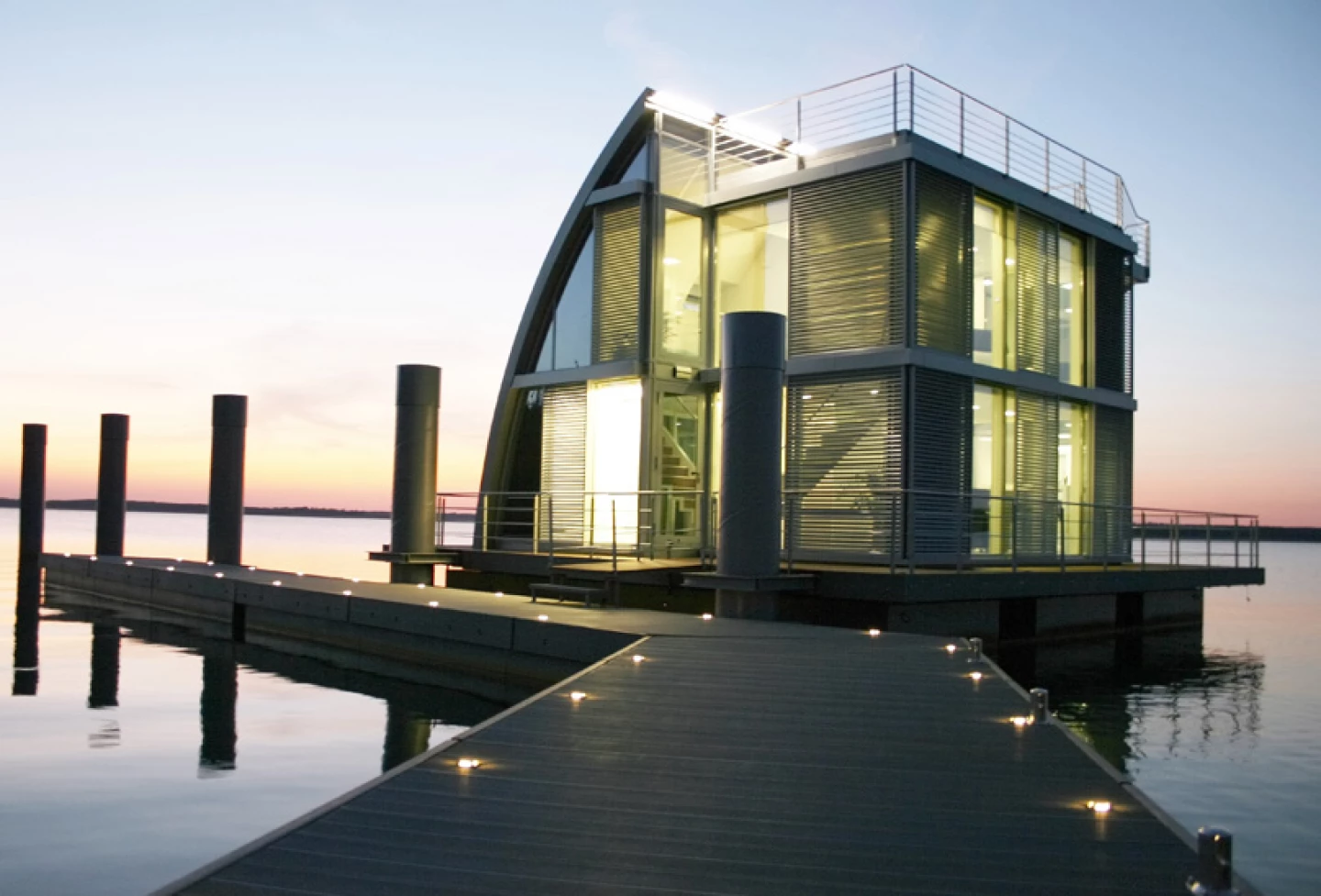 German lakeside resort features a collection of floating homes