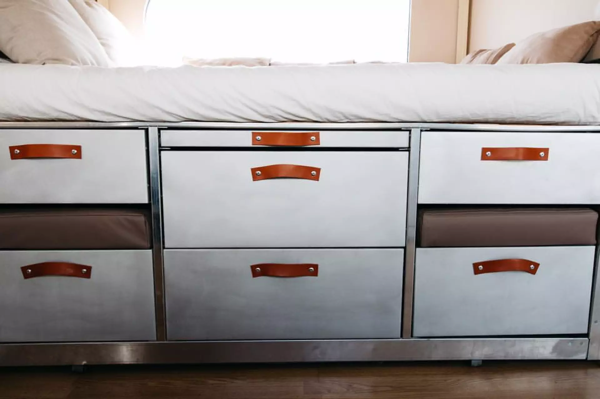 Sleek, compact camper pod grows to 3 times its size at the push of a button