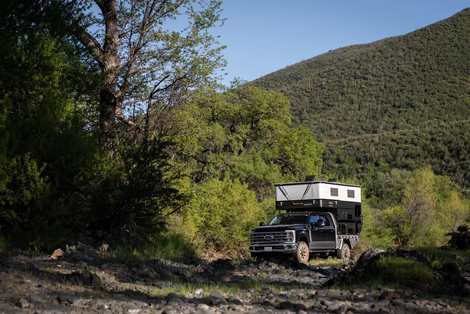 Four Wheel Campers Hawk+ self-contained off-grid pickup truck camper