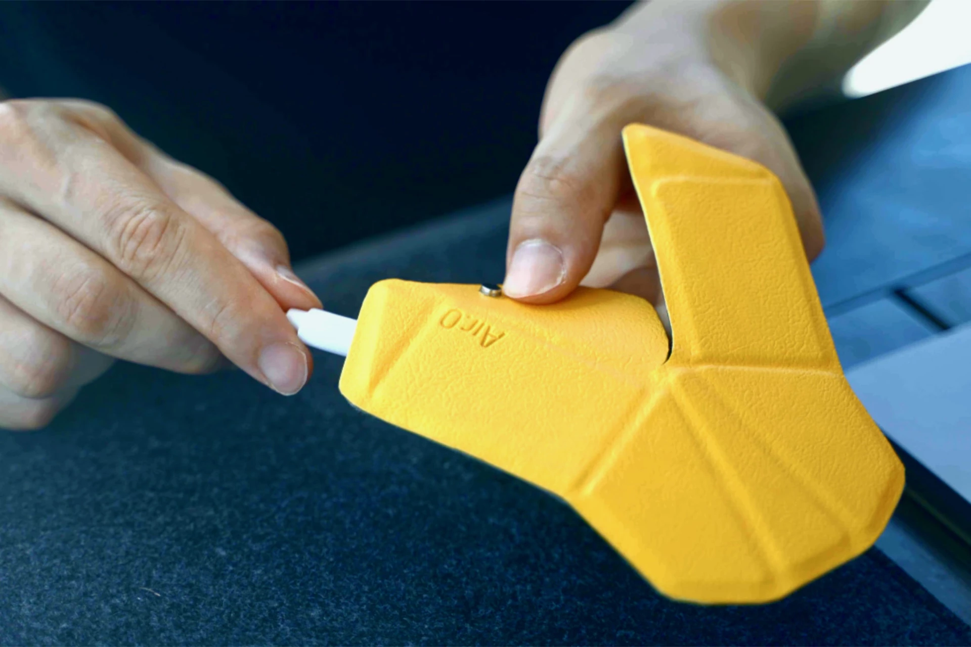 Air.0 origami computer mouse folds flat to be packed away