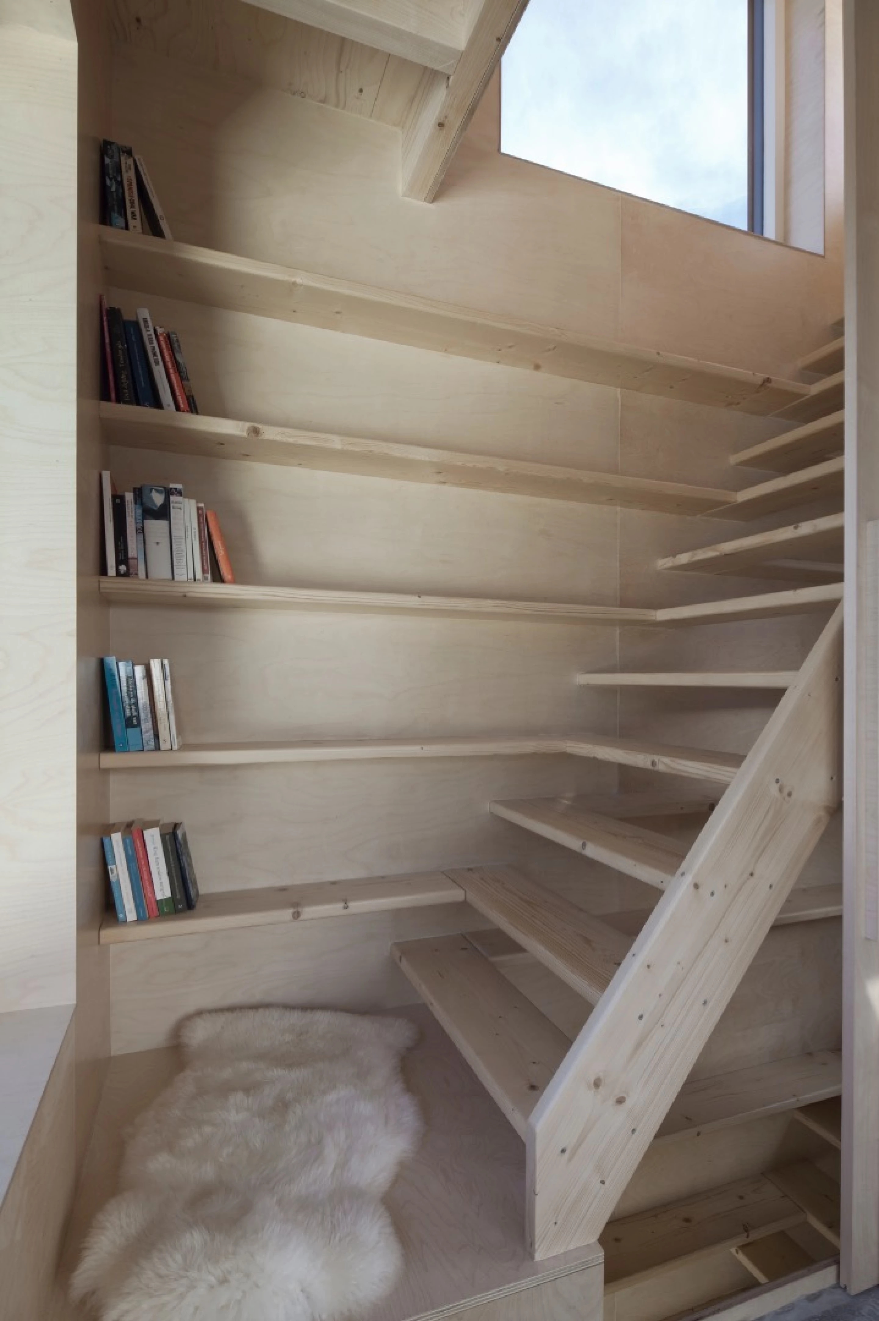 Skinny house is smaller than a couple of parking spaces