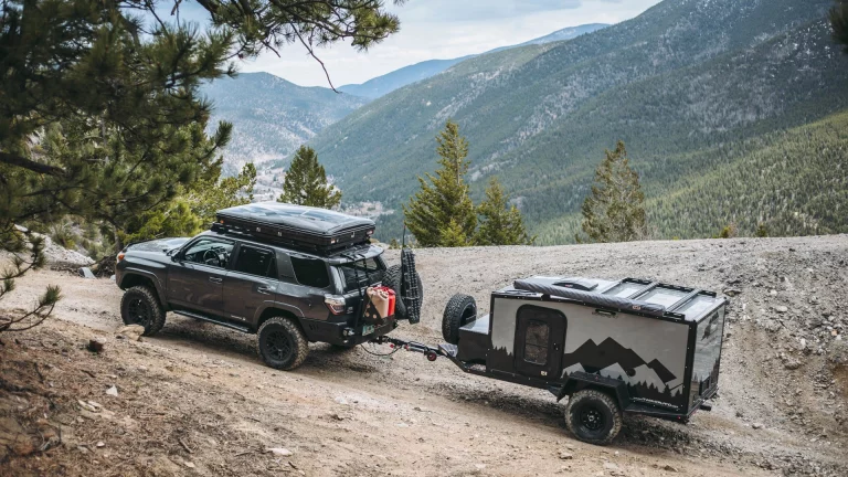 Boreas composite off-road camper trailer leaves the wood in the forest