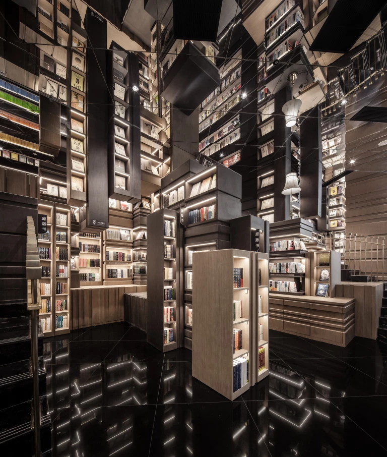 Surreal Chinese bookstore warps space with glass, color and light