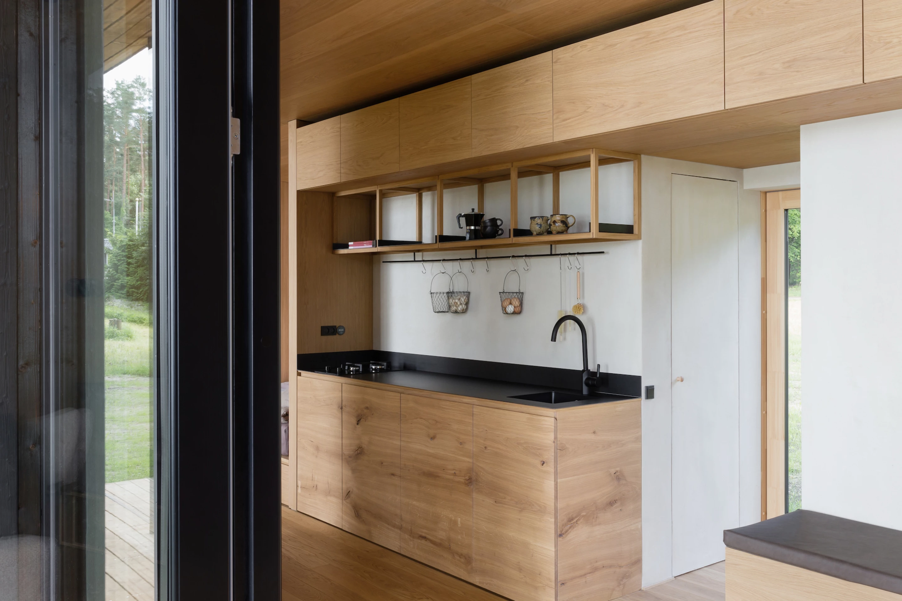 Kitchen maker incorporates offcuts into attractive tiny house build
