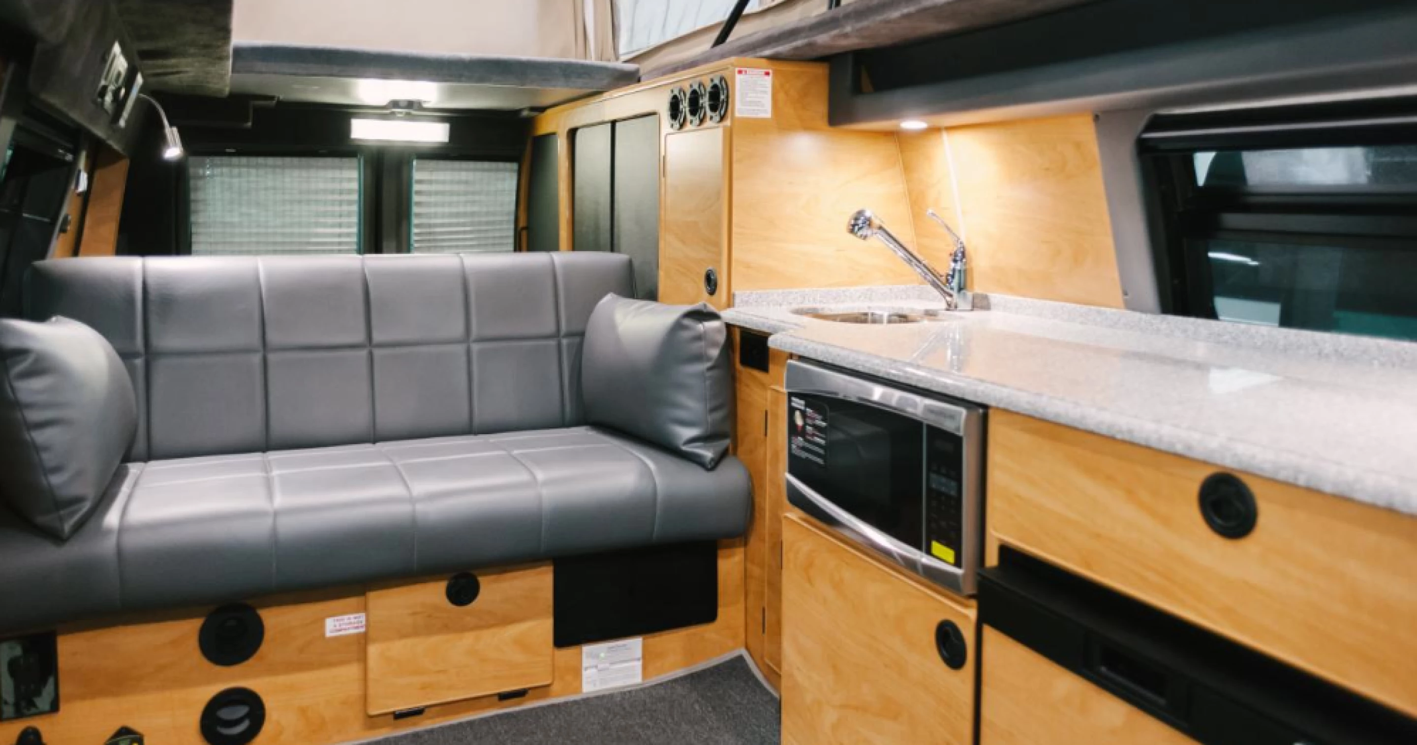 Sportsmobile builds custom fiberglass cabin for new camper van