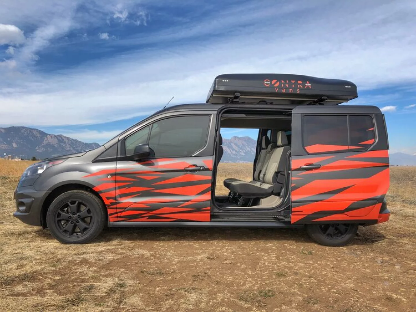 Fiery $35K+ Ford mini-campervan seats and sleeps a family of five