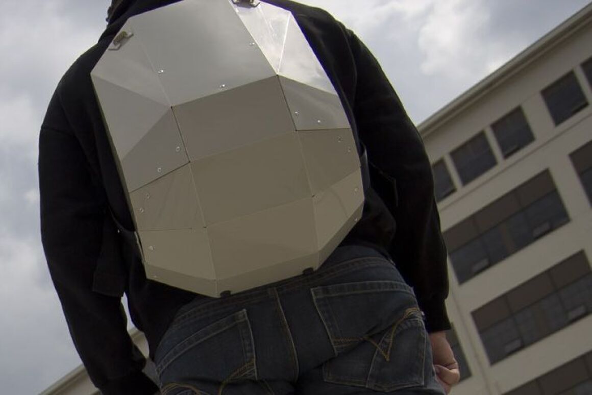 Solid Gray armadillo-inspired backpack designed to keep your gadgets safe