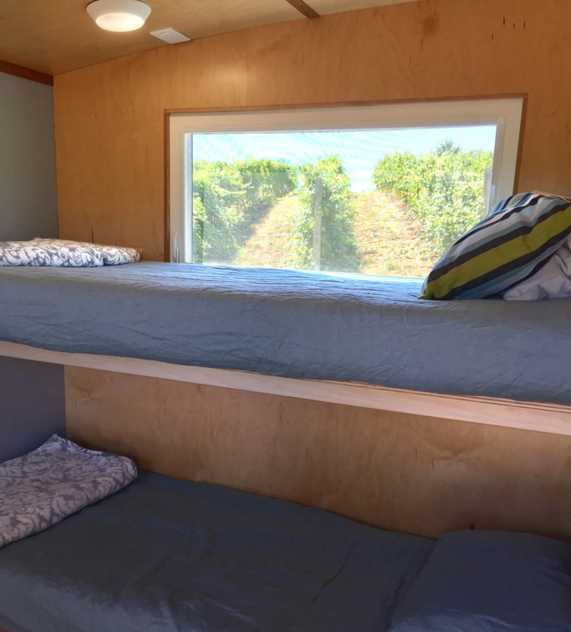 Off-grid wooden camping trailer sleeps up to 6 people