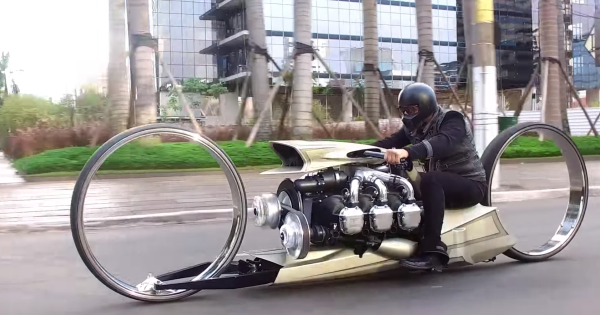 TMC Dumont sits 36-inch hubless rims either side of a roaring aircraft ...