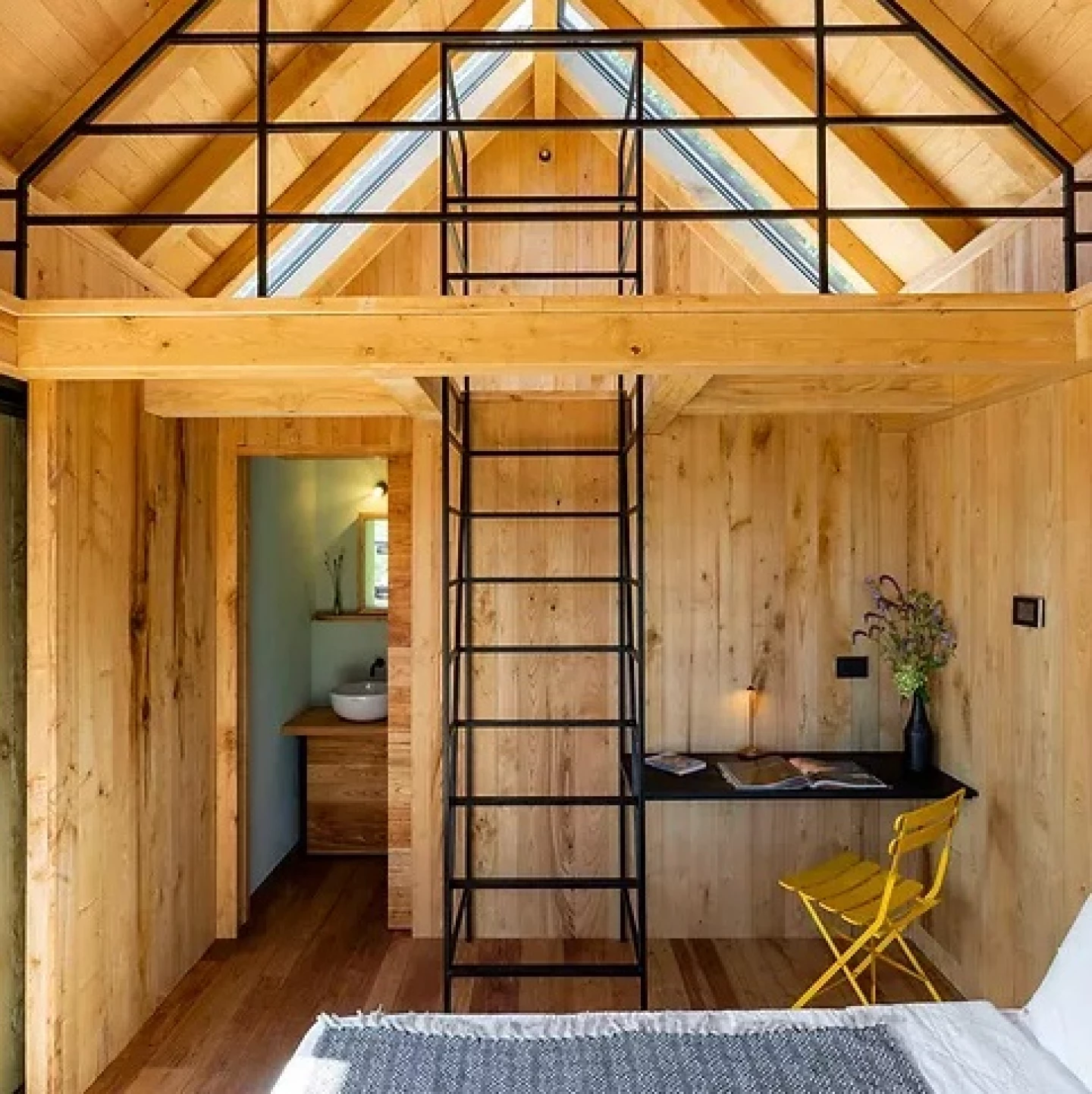 Micro-cabin in Ligurian Alps features a bed that can be rolled outside