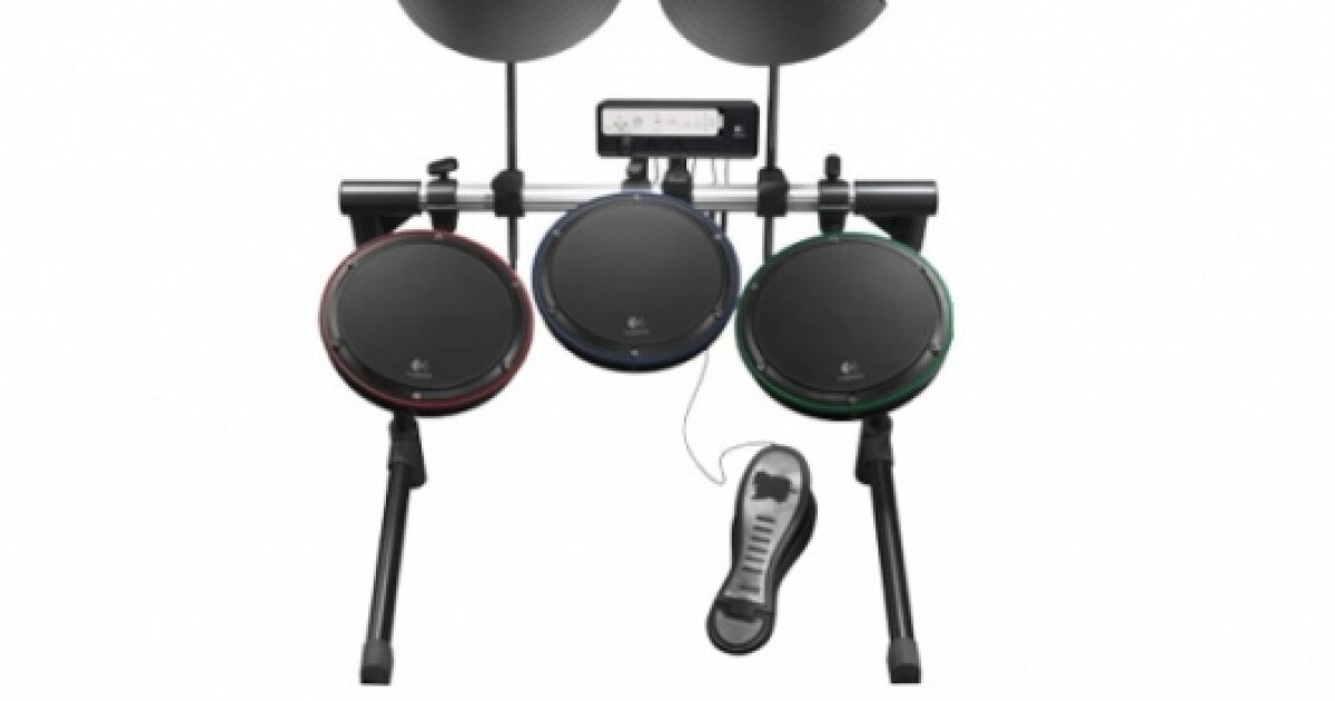 Logitech rock Wii and Xbox 360 with Wireless Drum and Guitar Controllers