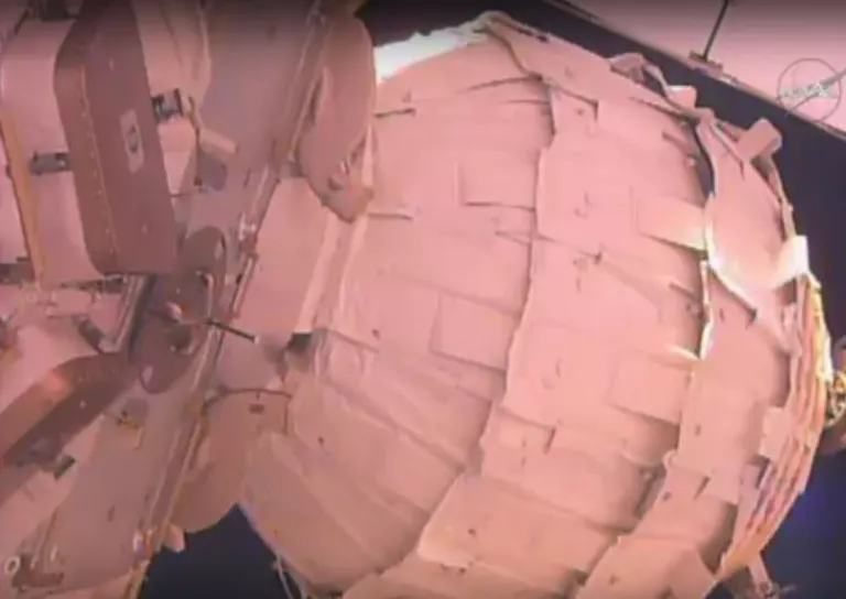 Inflatable module pops to full size on ISS