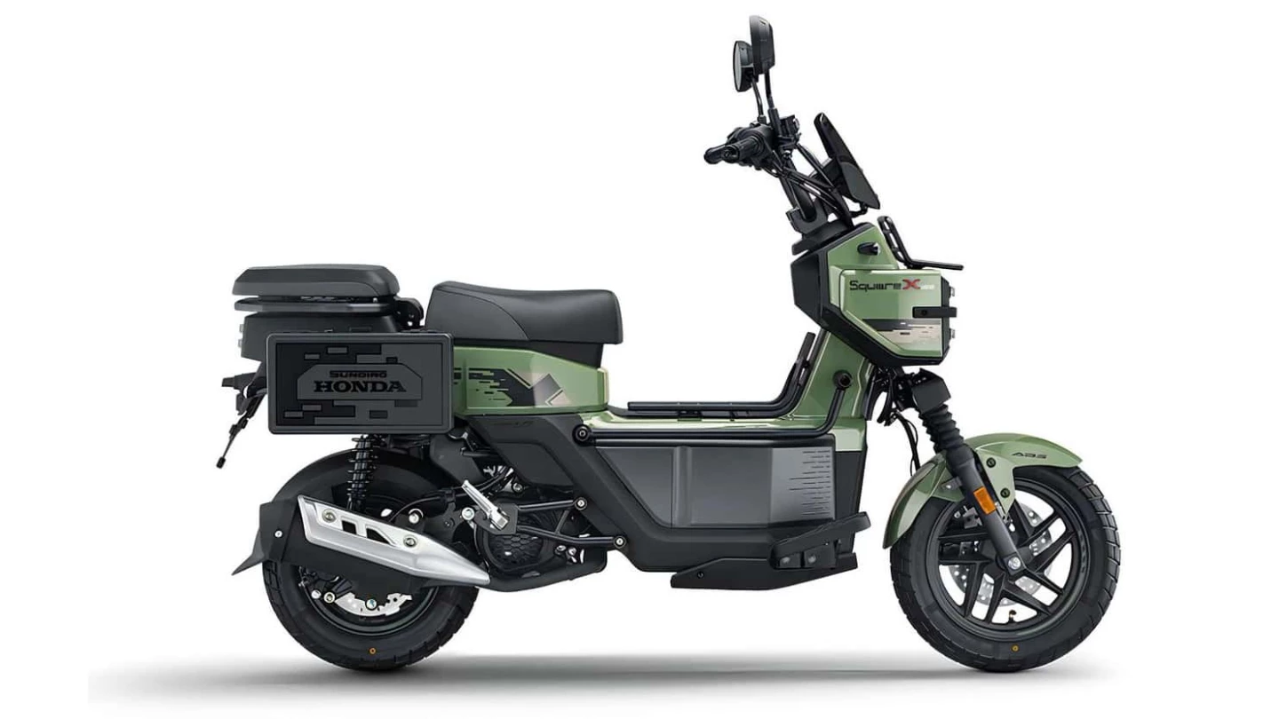 Honda Sundiro Square X125 adventure scooter with a folding table