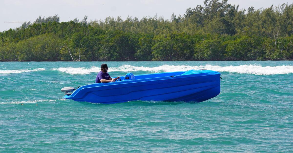 Vision complements e-outboards with "unsinkable" fully recyclable boat