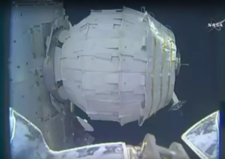 Inflatable module pops to full size on ISS
