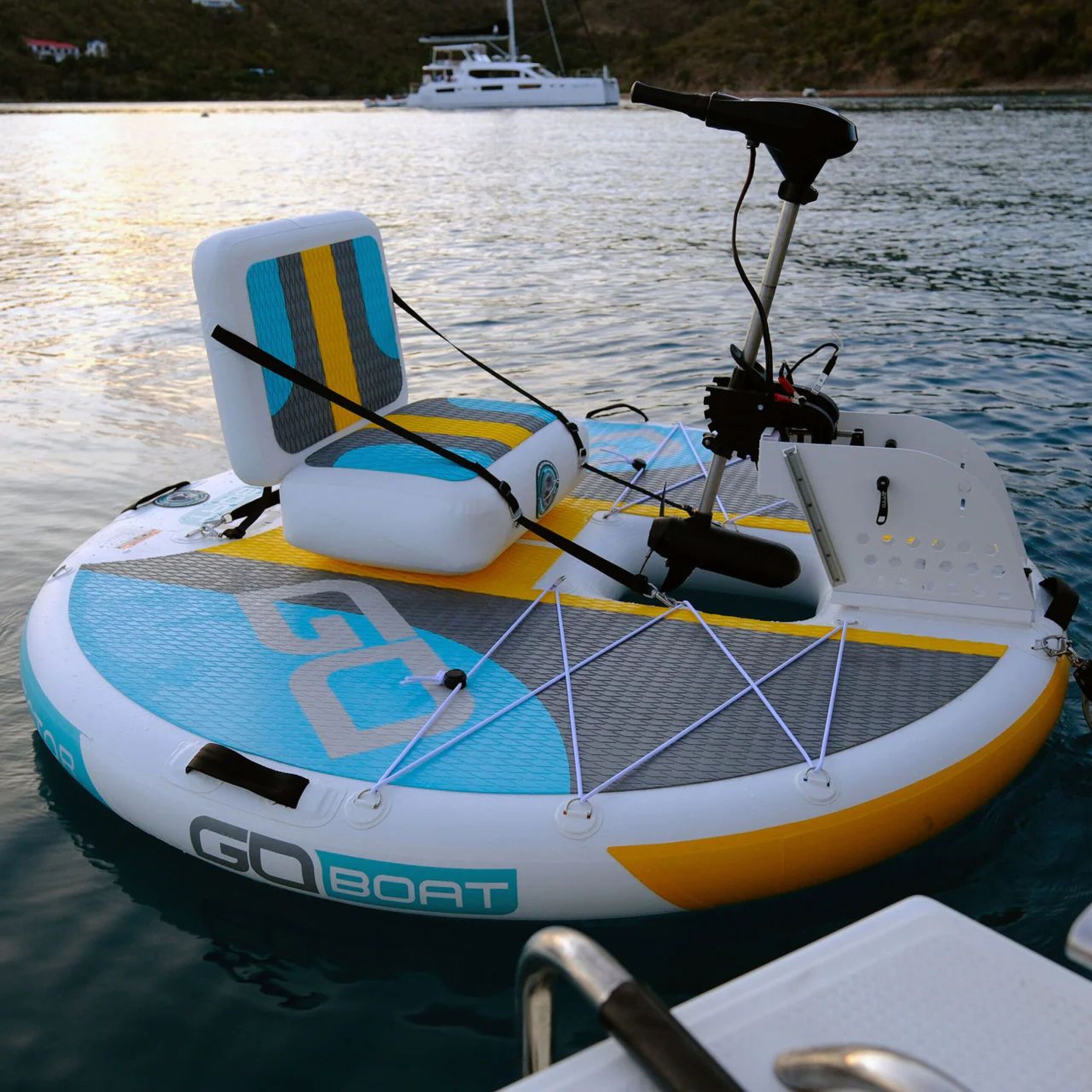 Inflatable motorized GoBoat packs down into a carry bag