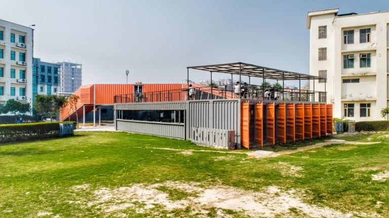 Indian cafe embodies "infinite possibilities" of shipping containers