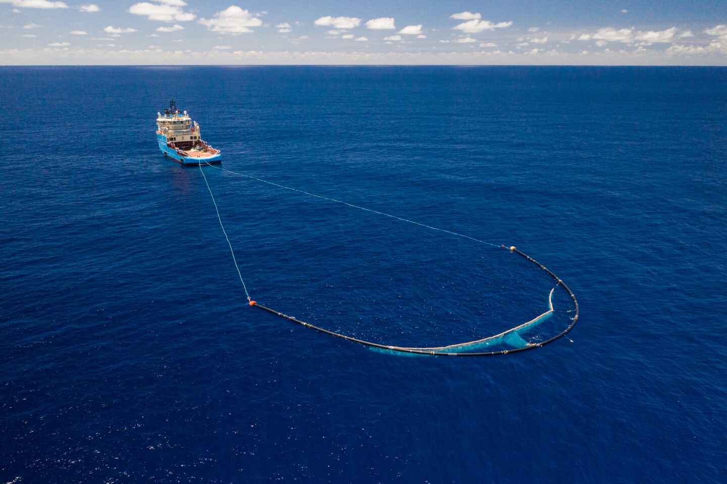 Ocean Cleanup attaches parachutes to trash-collecting barriers to ...