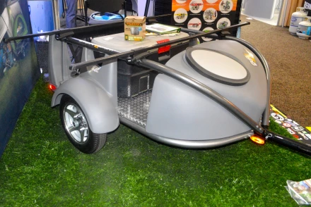 GO-Easy ultralight trailer/camper rides behind a motorcycle or small car