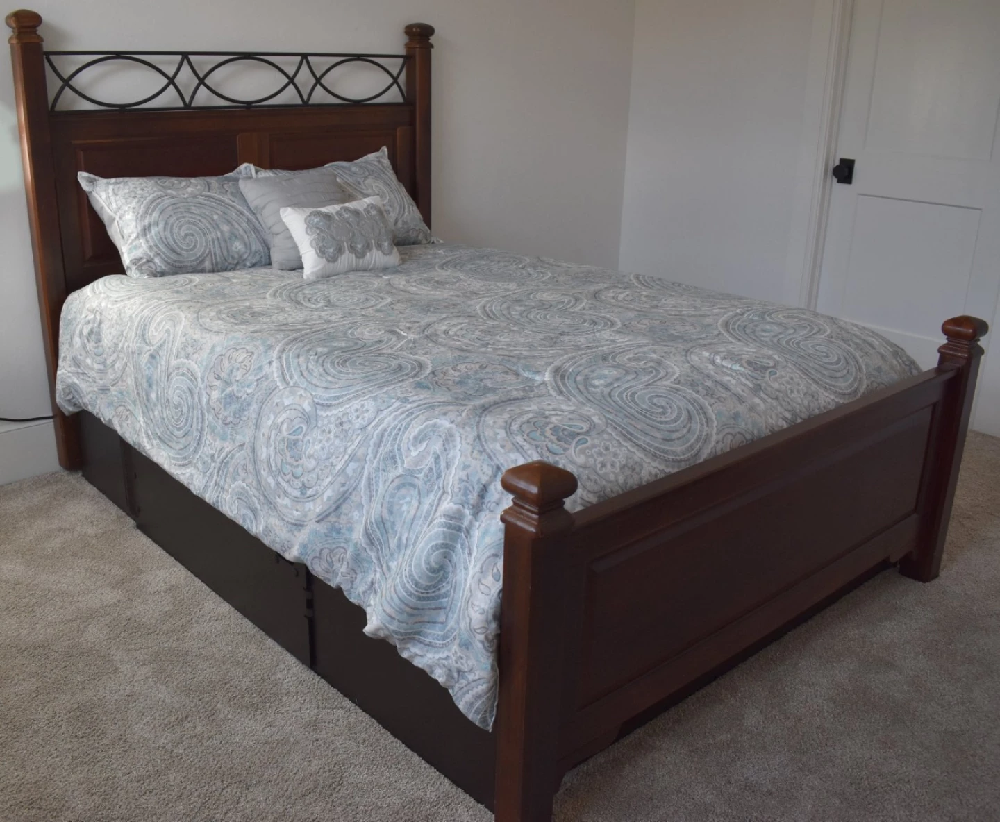 Telescoping bed frame doubles as a tornado shelter
