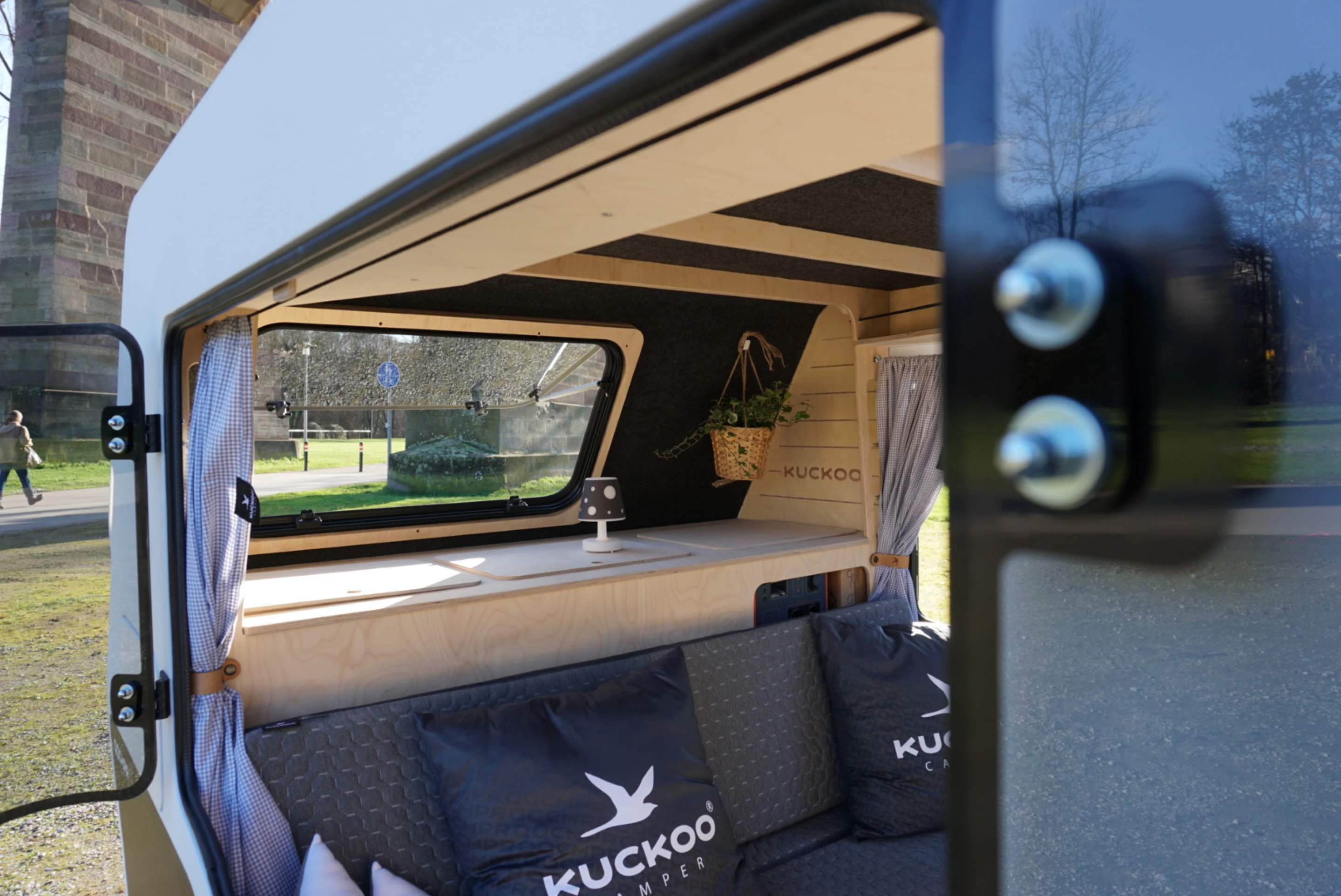 Kuckoo tiny camping trailer blows open big panorama with glass doors
