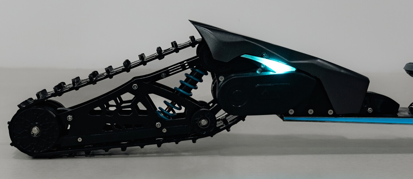 Sassy skis sport motorized treads for an electric boost