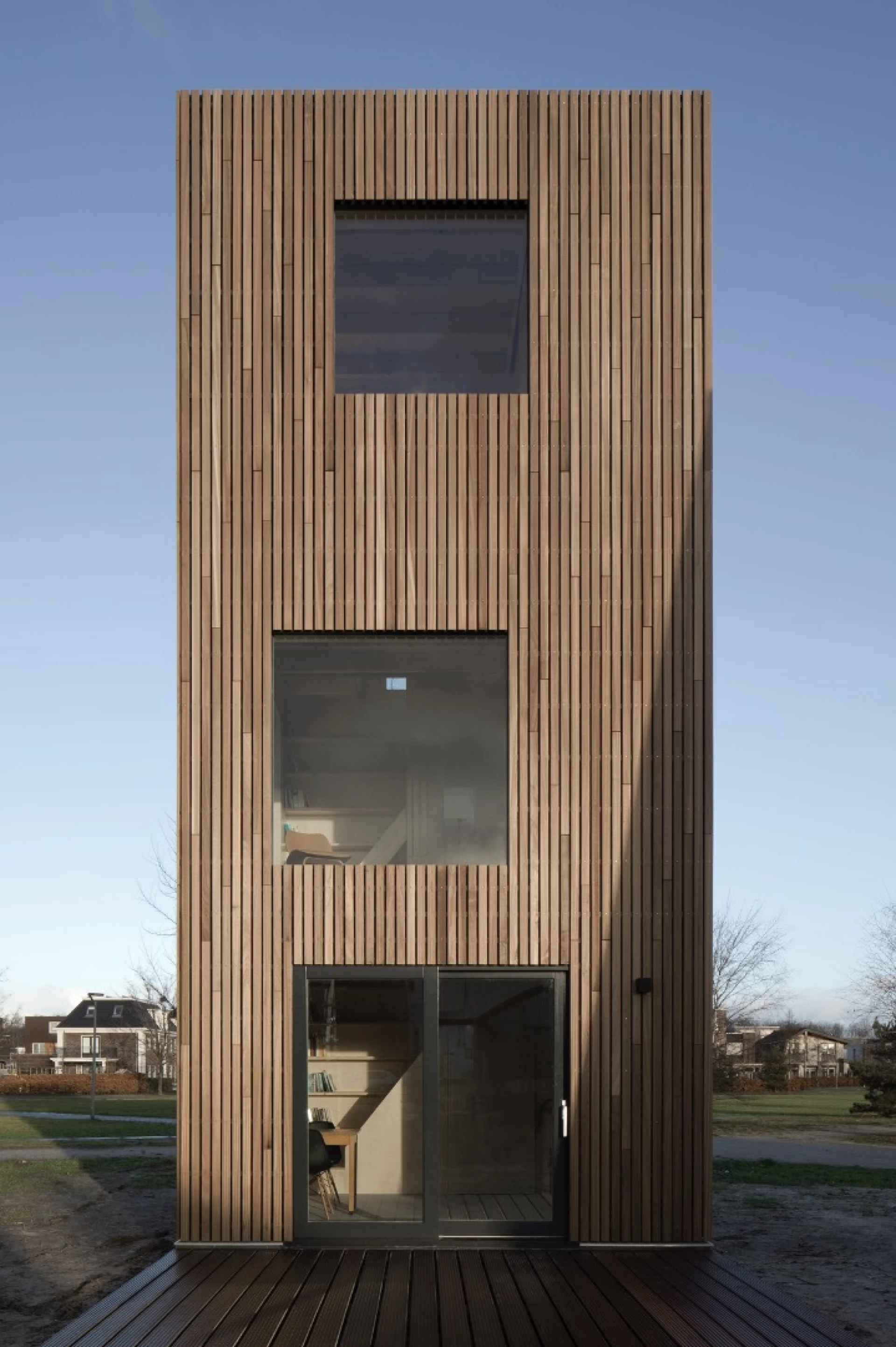 Skinny house is smaller than a couple of parking spaces