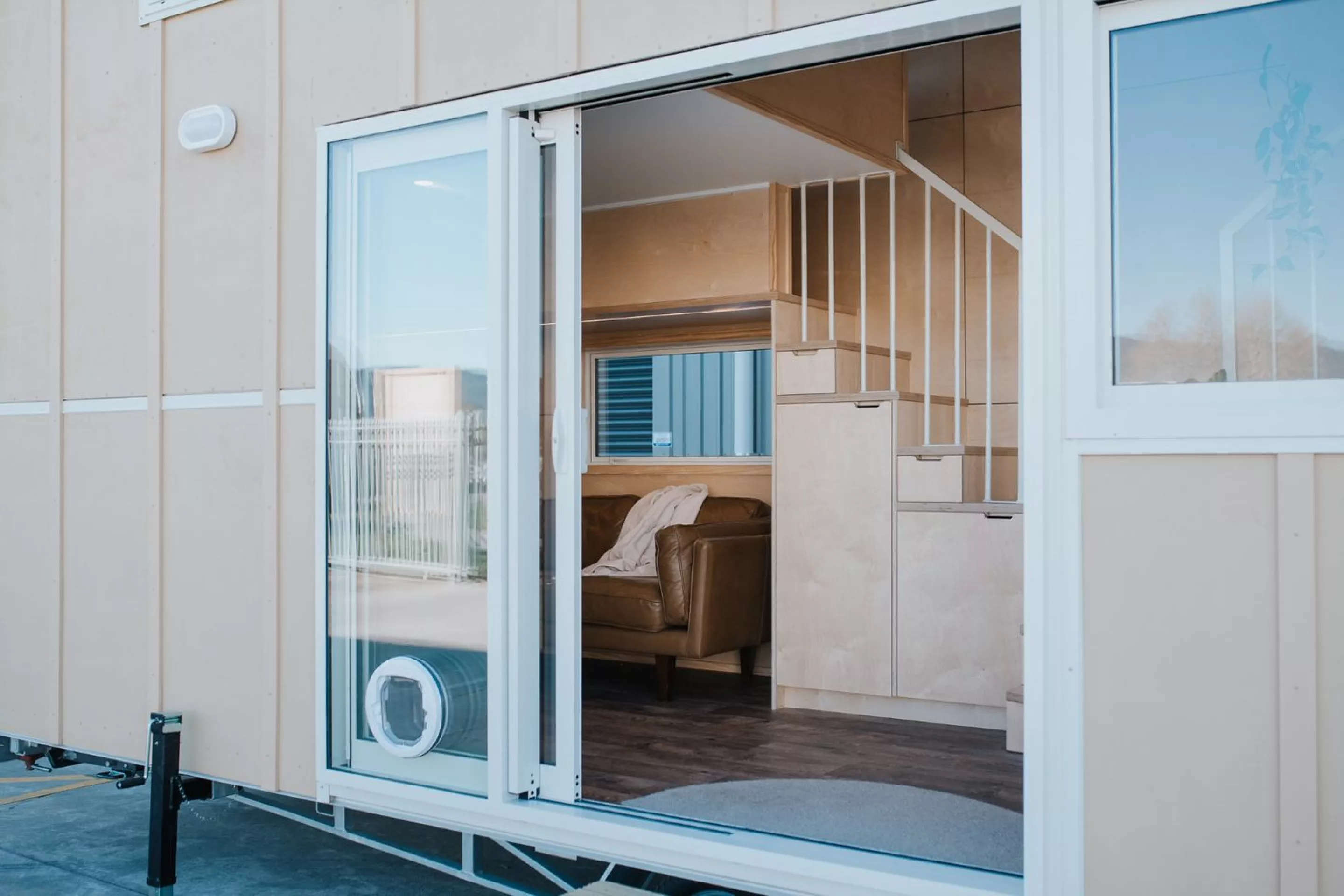 Babbalucci tiny house splits the staircase to add storage inside