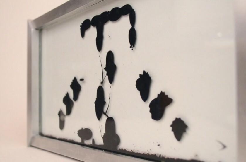 Ferrolic uses ferrofluid to tell the time