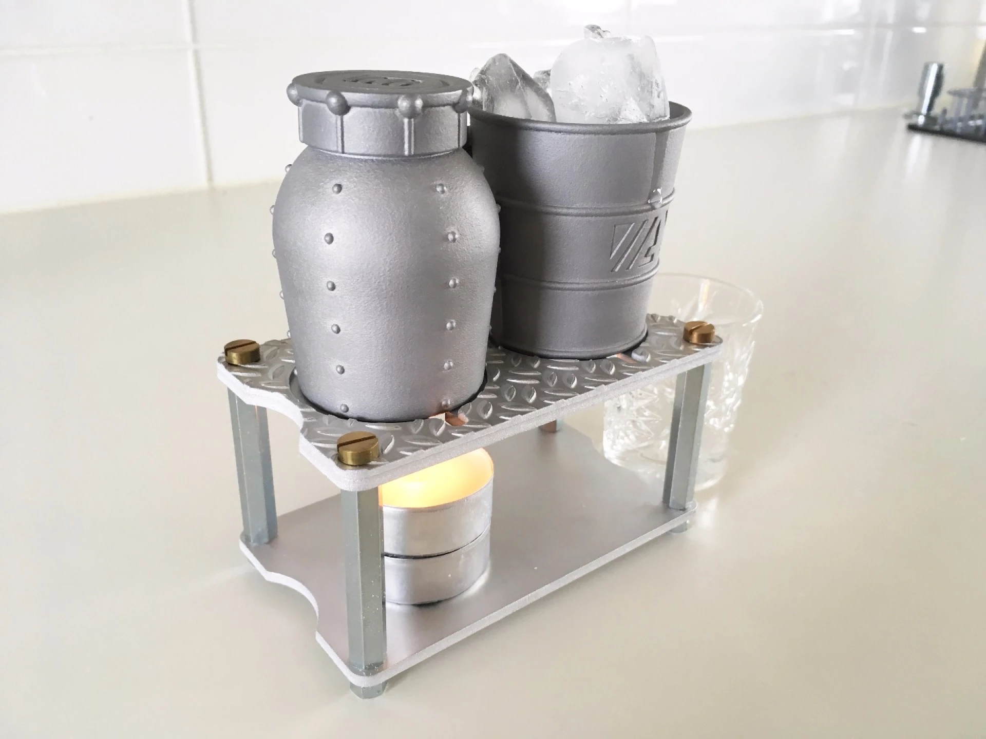 Metal desktop distillery designed for the executive who has everything