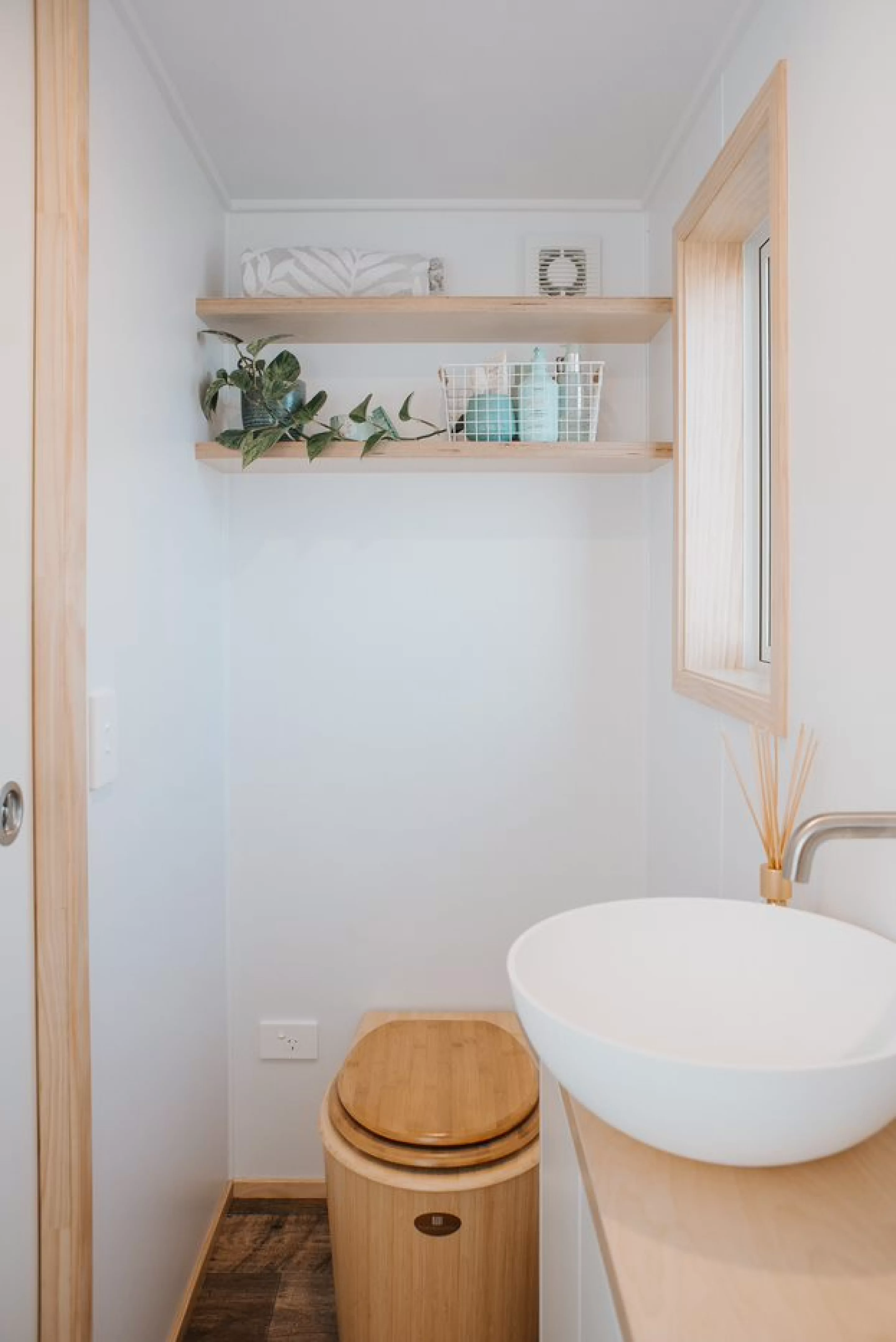 Babbalucci tiny house splits the staircase to add storage inside