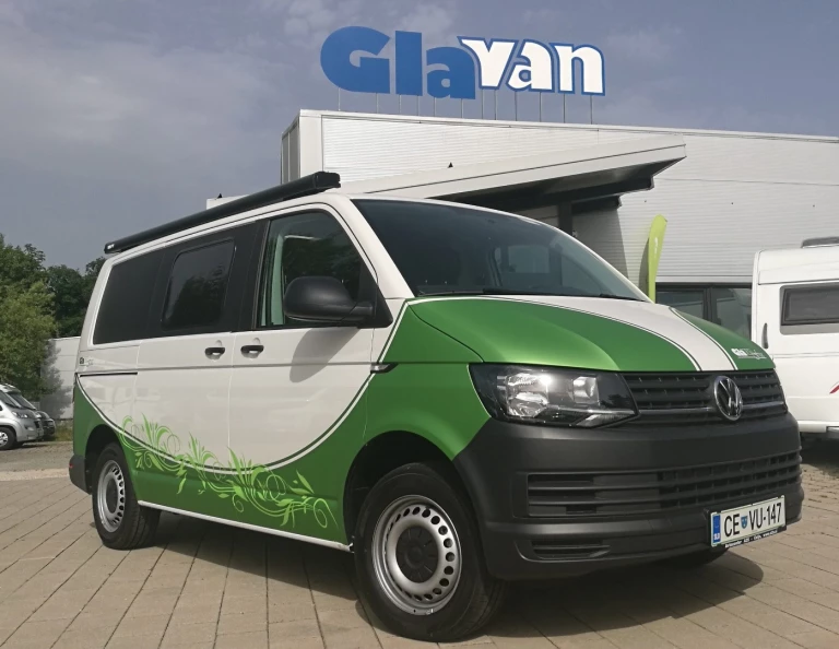 Glavan walls off the VW T6 to create a cozy adventure camper van for two