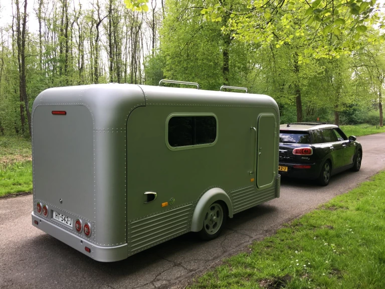 Stylish caravan cabriolet peels back its roof to connect with nature