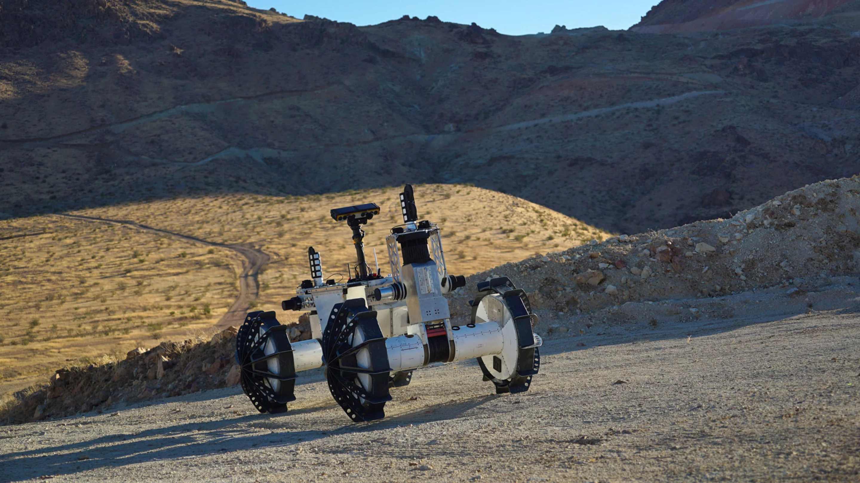 Wheeled NASA rover splits in two to explore craters
