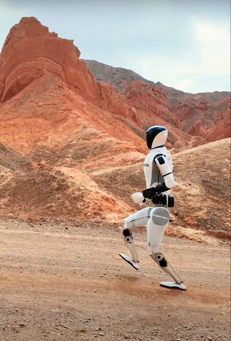 Watch: Sneaker-wearing humanoid beats barefoot bot on Gobi fun run