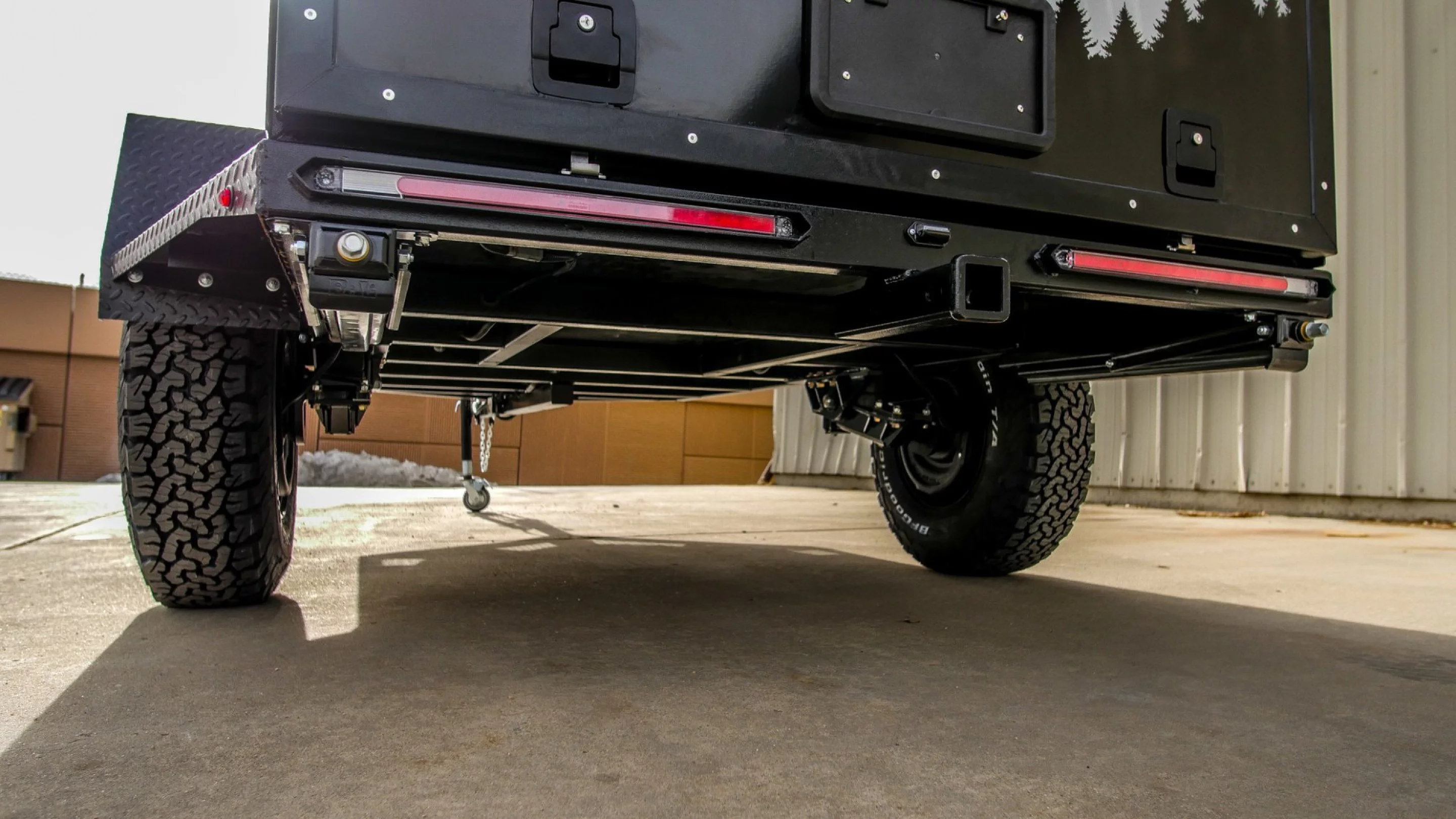 Boreas composite off-road camper trailer leaves the wood in the forest