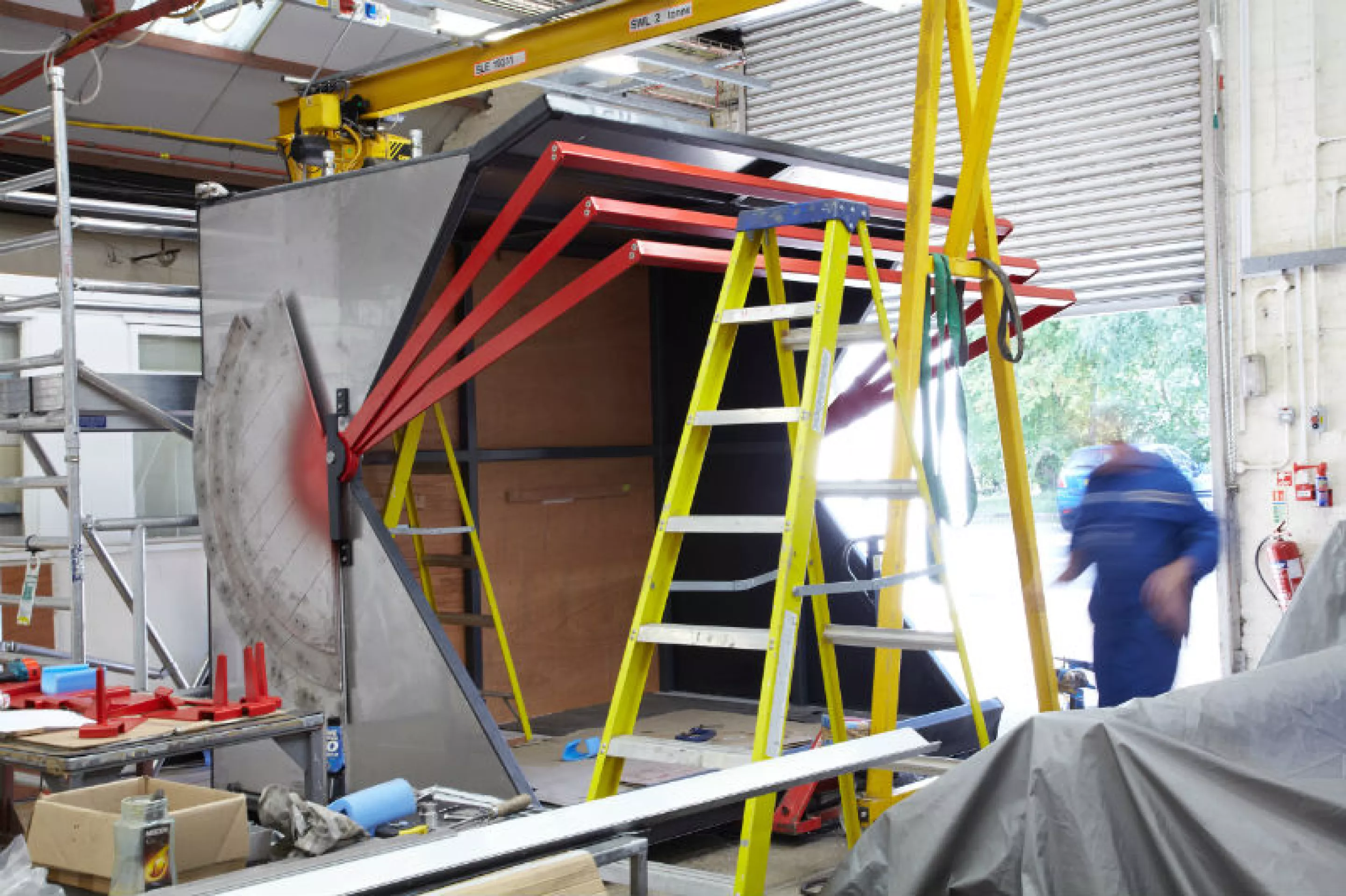 Architects re-imagine kiosk as fan-like folding structure
