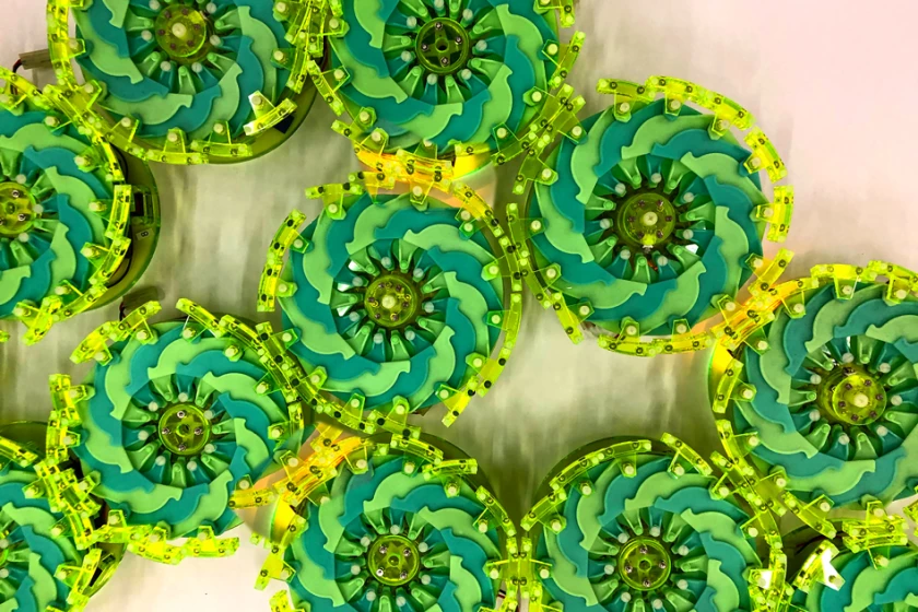 Robotic "particles" swarm together to move towards the light