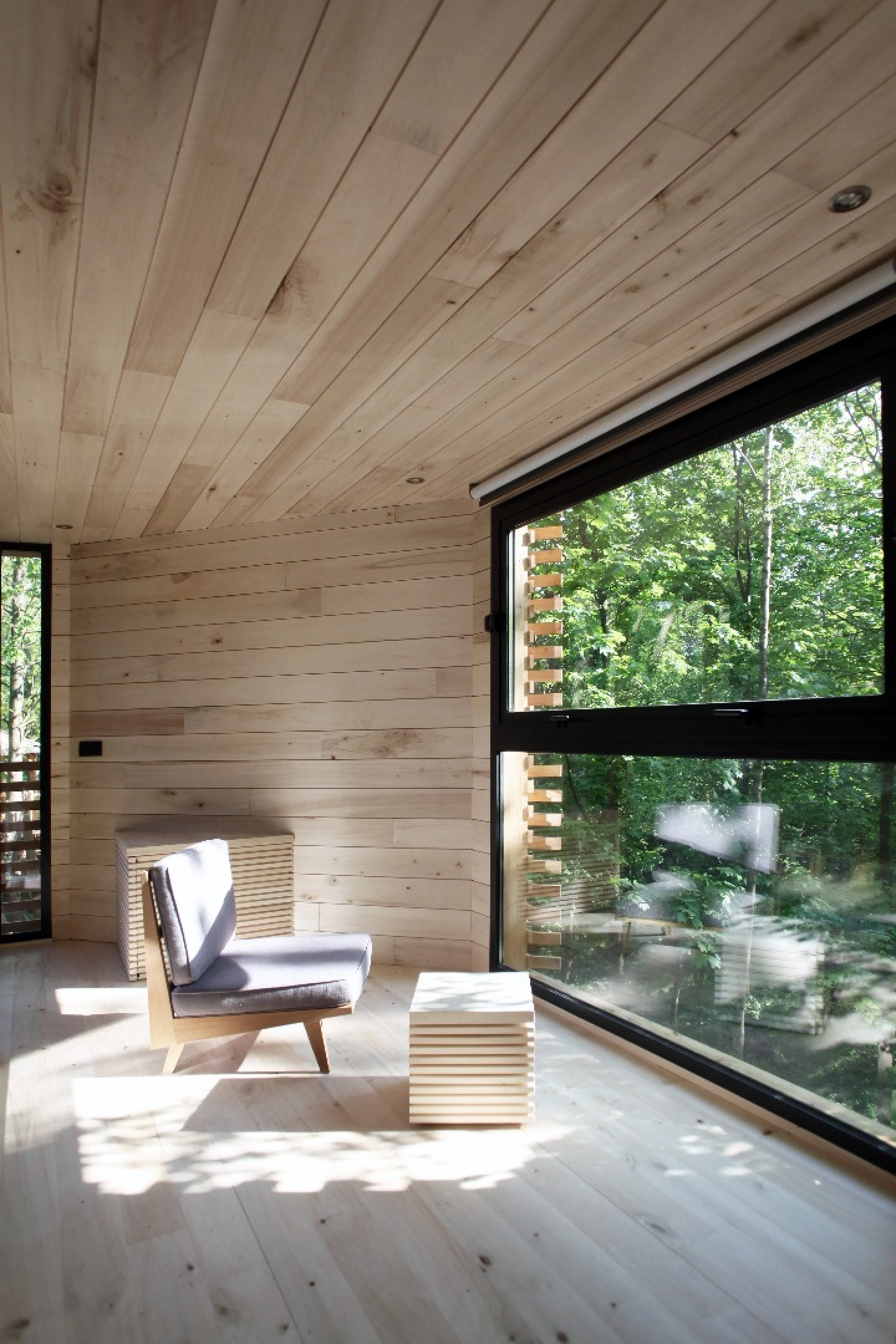Geometric treehouse packs unexpected treetop luxury