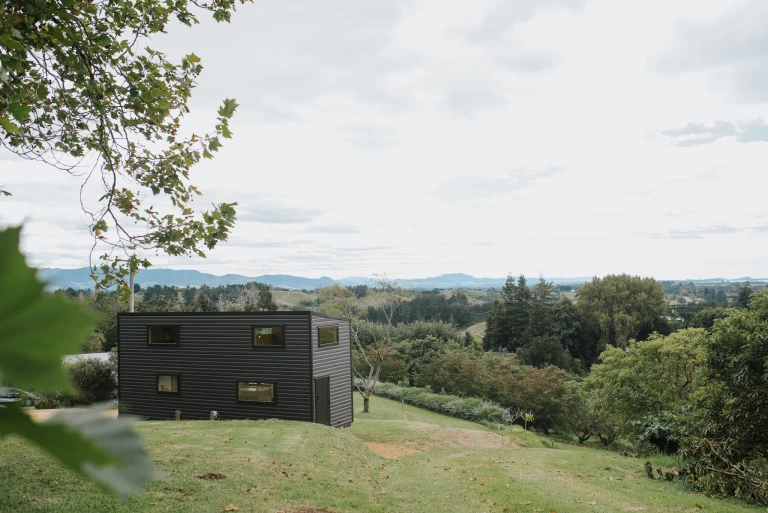 Nugget tiny house doubles up on staircases and storage space