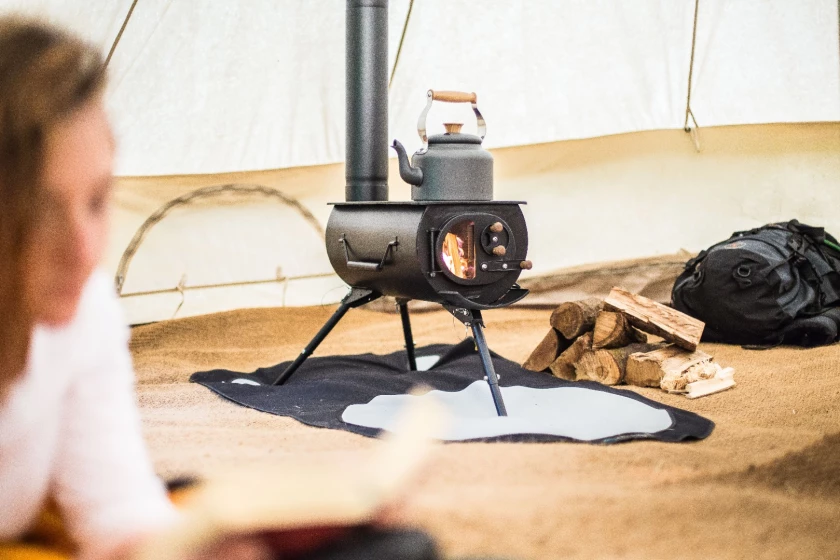 Portable wood-burning stove offers heat on the go