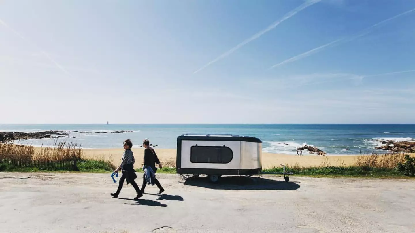 Sleek, compact camper pod grows to 3 times its size at the push of a button