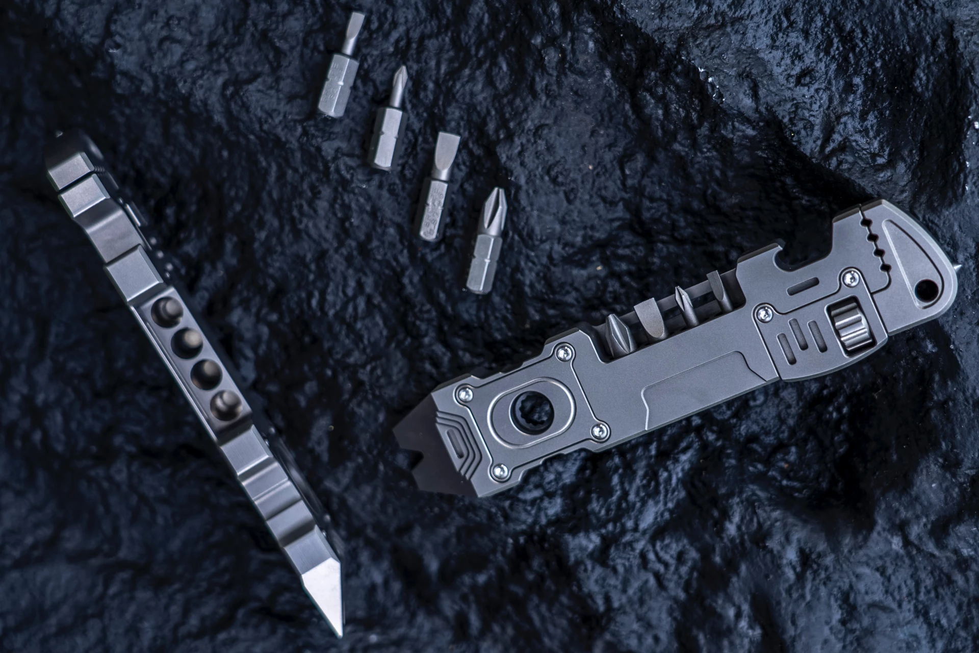 Six-function ratcheting titanium multitool packs its own bits