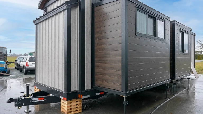 Sizable tiny house expands living space with triple slide-outs