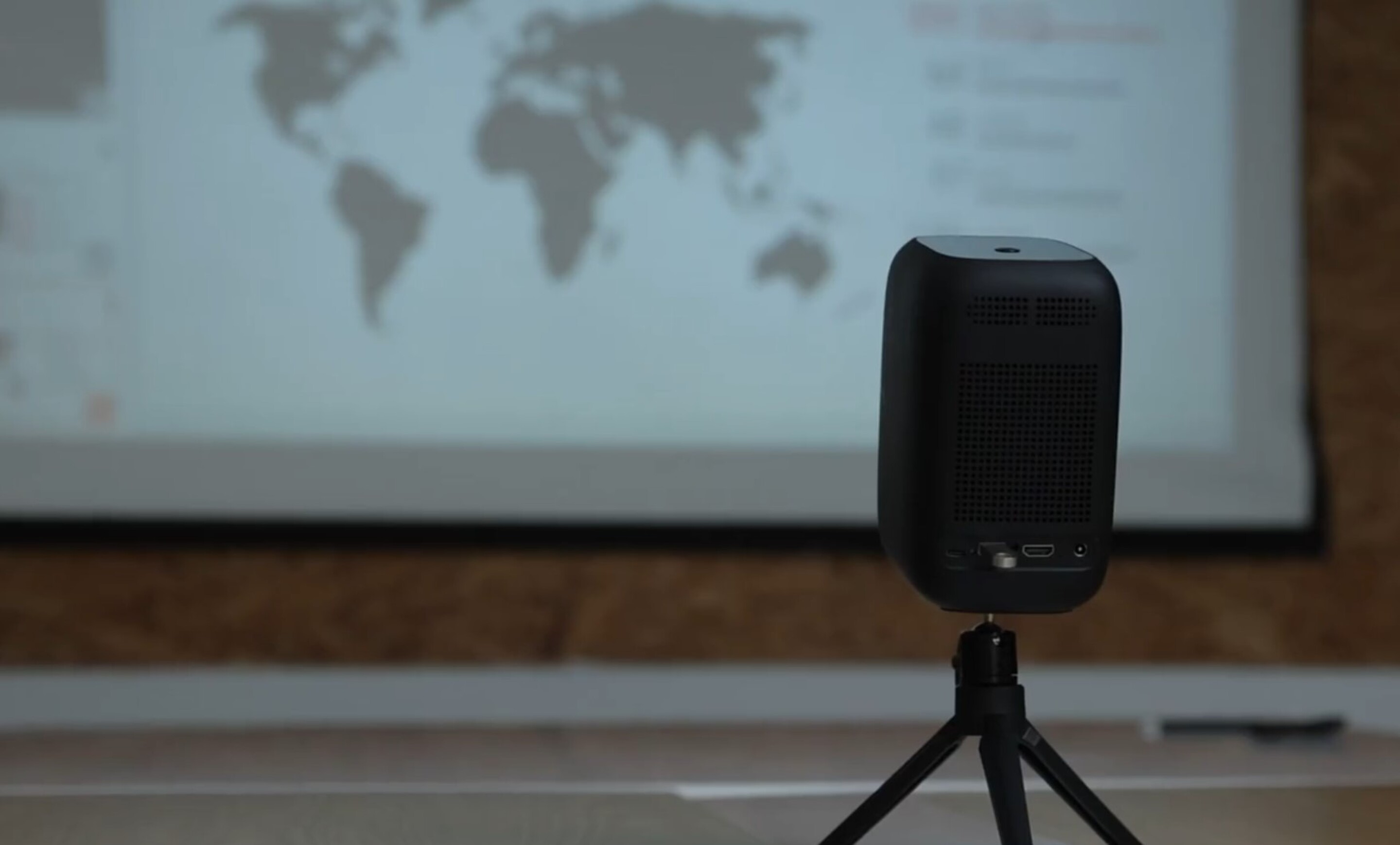 Portable projector features sealed optics and touch interaction